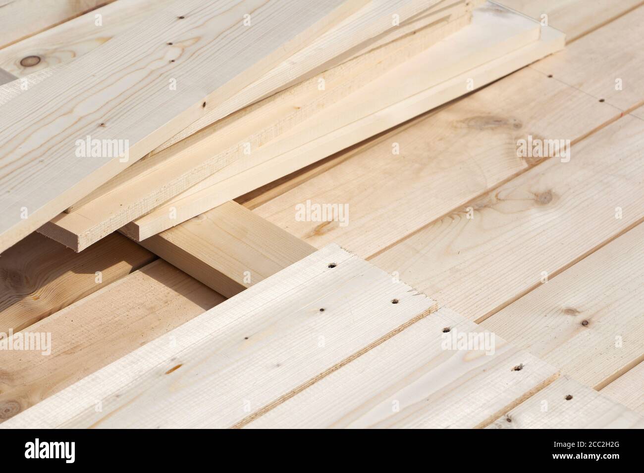 wooden planks on a construction site. Neatly folded Stock Photo - Alamy