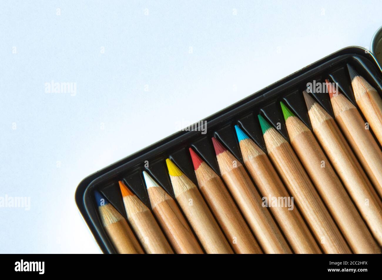 Beautiful set of colorful pencils stacked in a row Stock Photo - Alamy