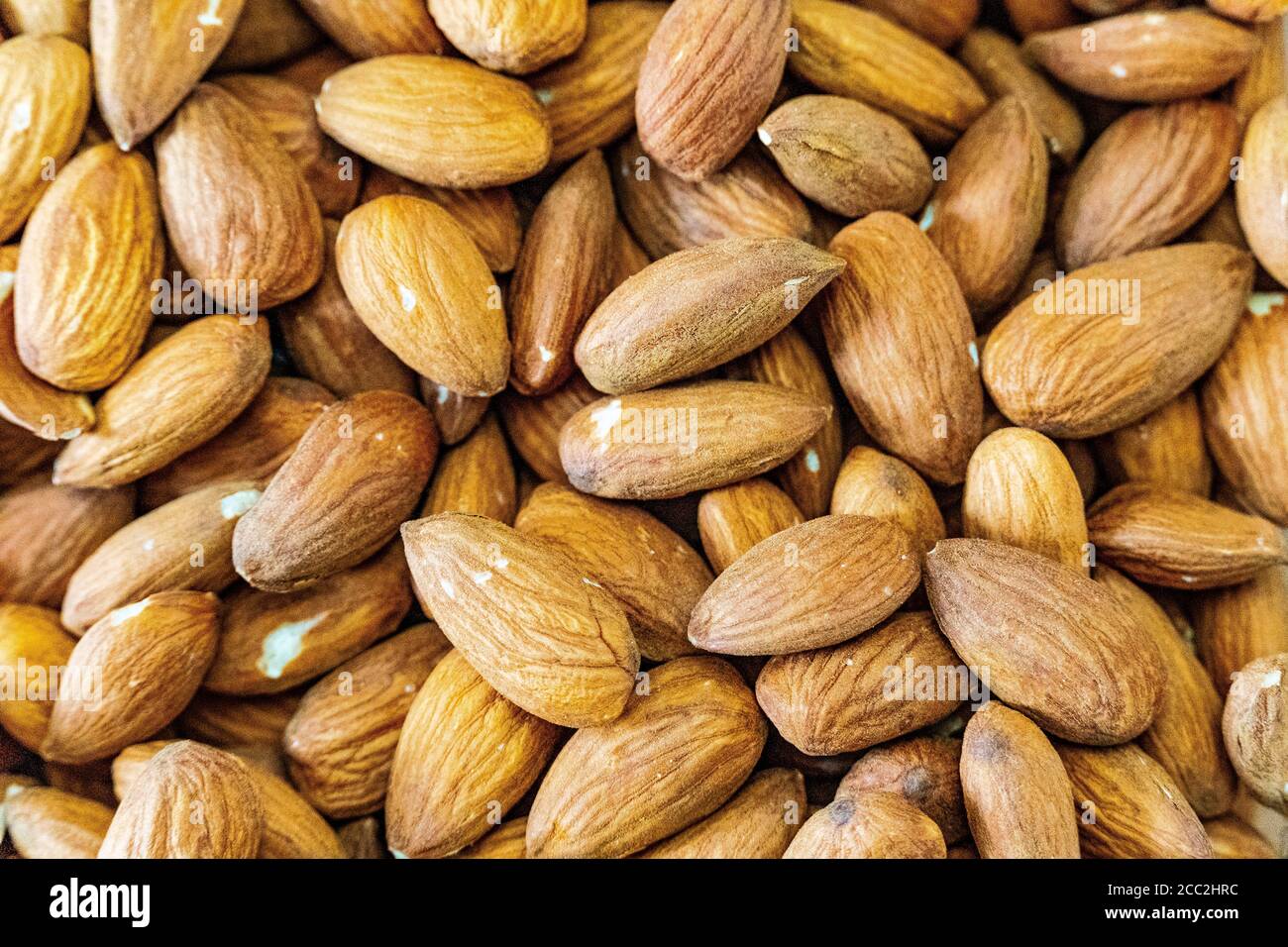Closeup overhead focus shot of almonds grouped together Stock Photo - Alamy