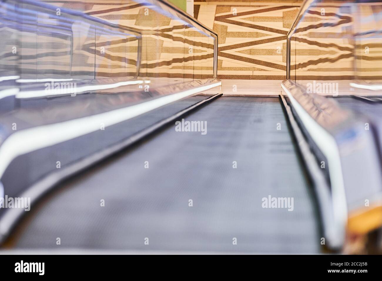 Moving walkway in shopping center. Horizontal slow-moving conveyor ...