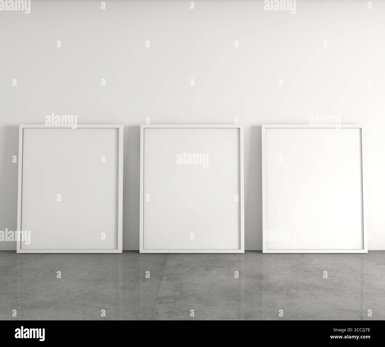 Empty wall with blank picture frames laid on the floor Stock Photo - Alamy