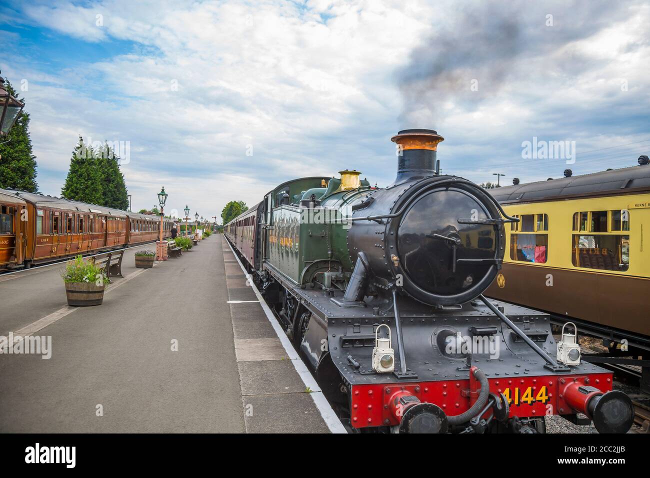 Front of vintage UK steam train (locomotive 4144) waiting alongside ...