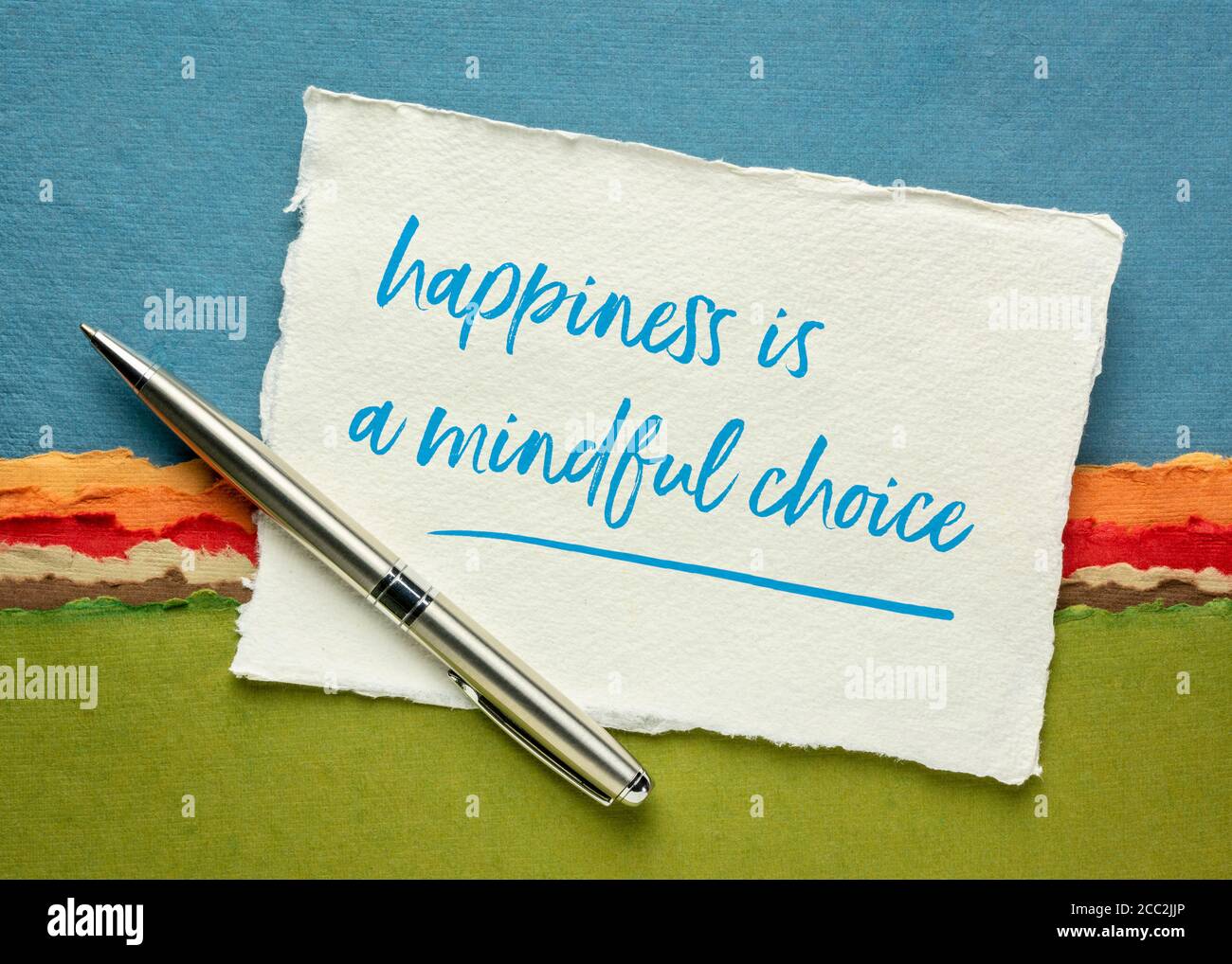 happiness is a mindful choice inspirational note on a sheet of white ...