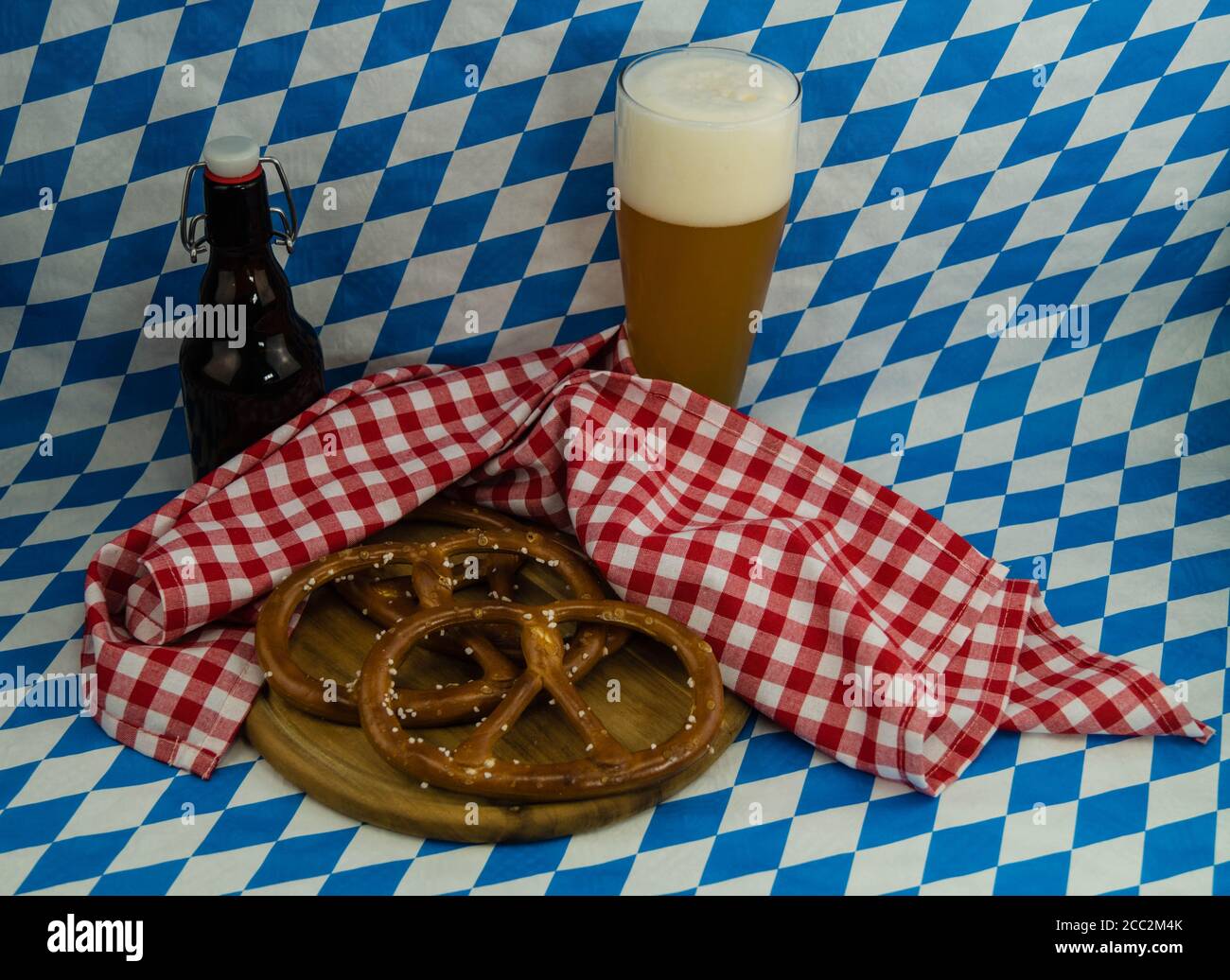 a bottle of beer and salty lye roll Stock Photo - Alamy