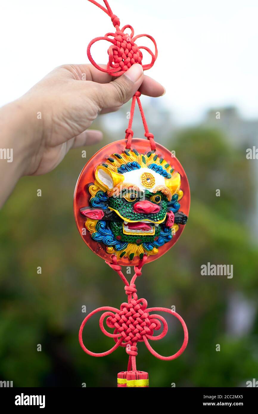 Feng Shui dragon face,multi colour hanging showpiece, hanging from hand ...