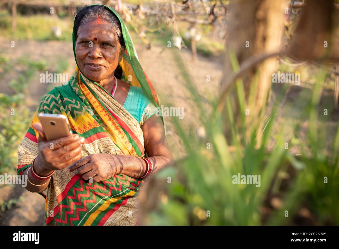 Villager cell phone hi-res stock photography and images - Alamy