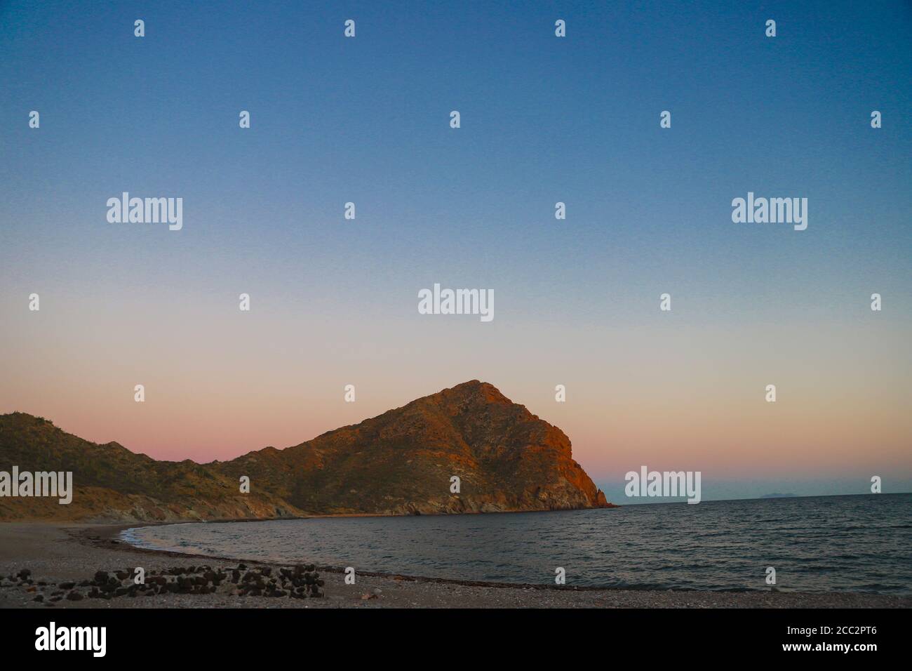 Red colored hill at sunset on El Colorado beach Sonora, Mexico. (Photo ...