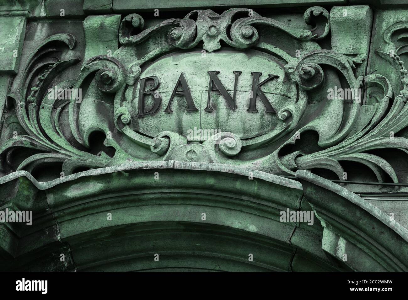 Bank sign over entrance door. Old bank building Stock Photo - Alamy