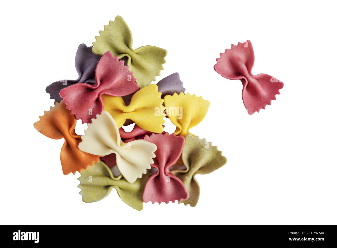 Raw colorful farfalle pasta. Pieces of traditional Italian farfalle ...