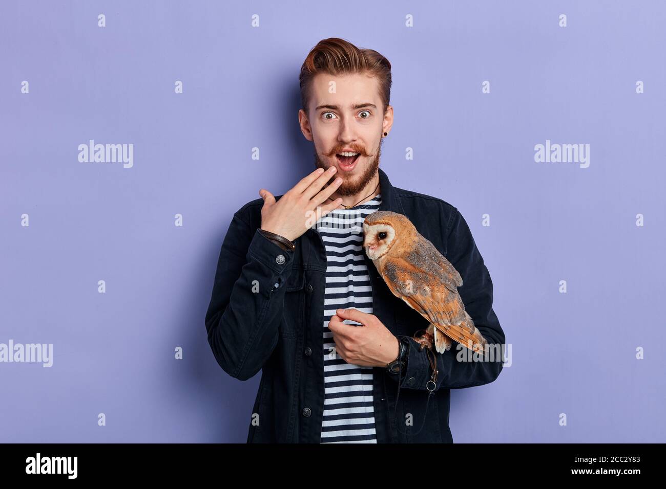 excited happy young man expresses happiness positive emotion and ...
