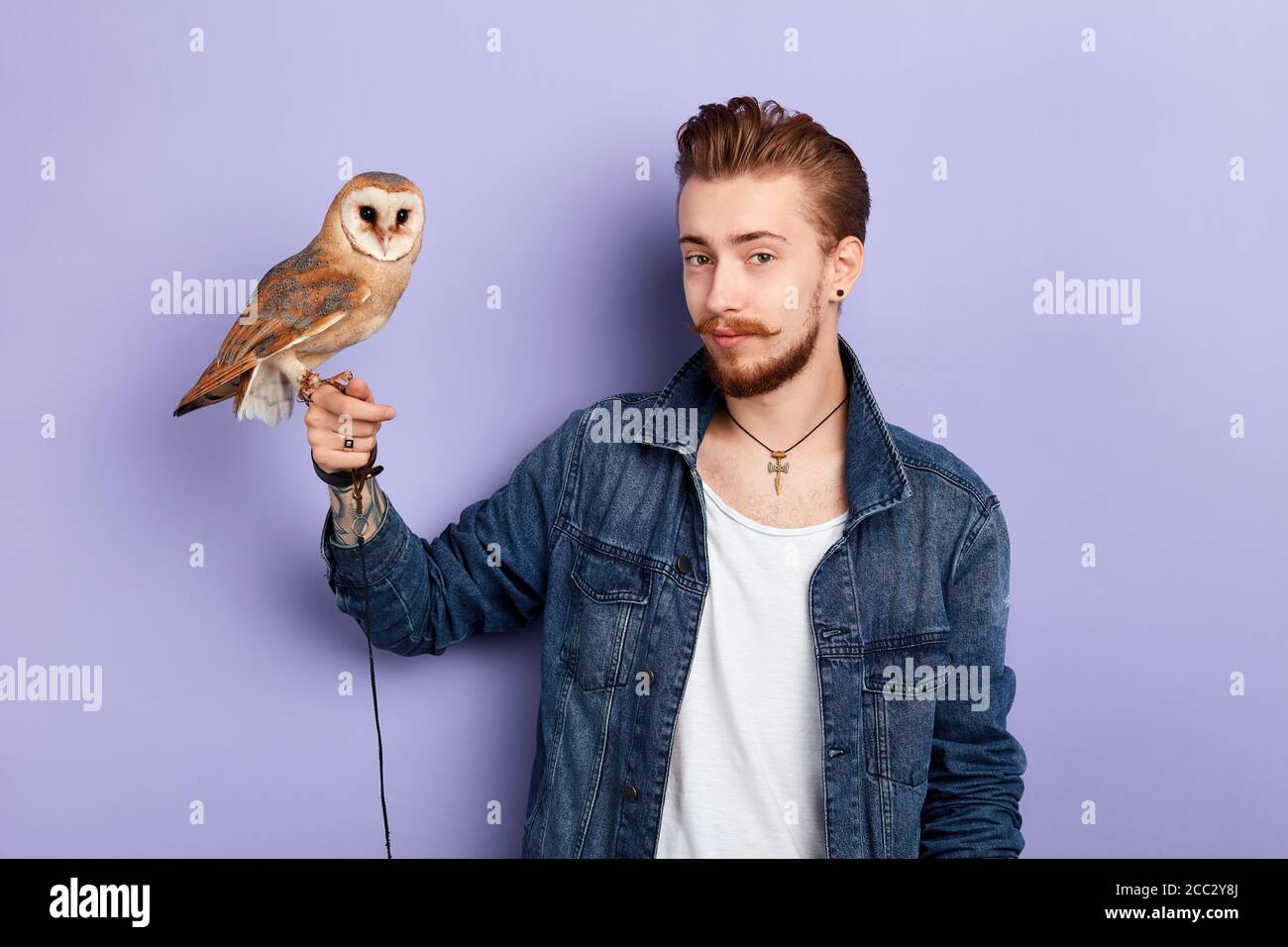 Male status symbol hi-res stock photography and images - Alamy