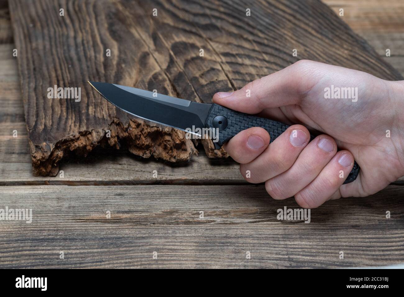 Small knife in palm hi-res stock photography and images - Alamy