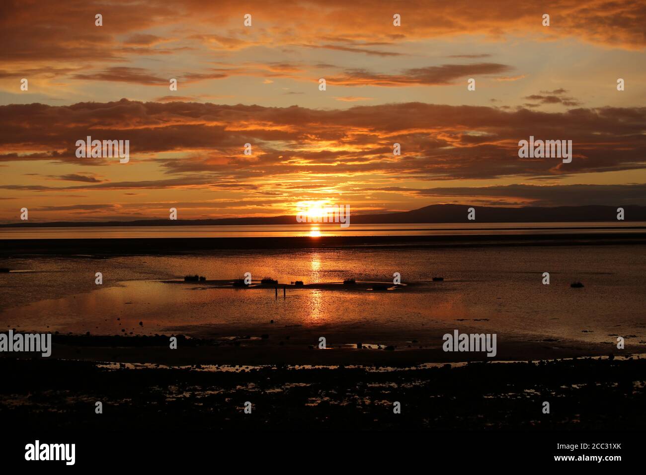 Morecambe Bay sunset Stock Photo - Alamy