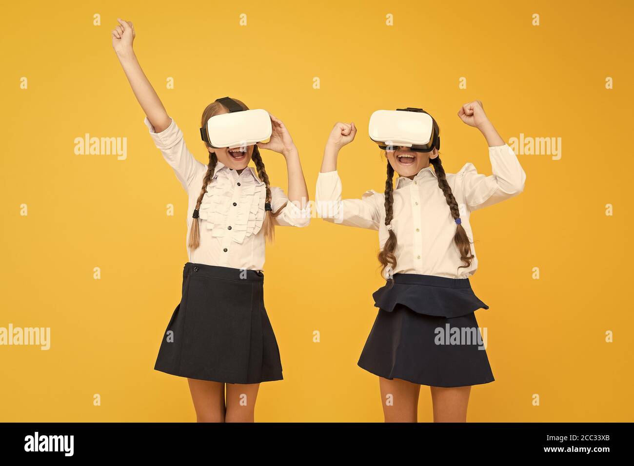 So real. Happy kids use modern technology. virtual reality. small girls ...