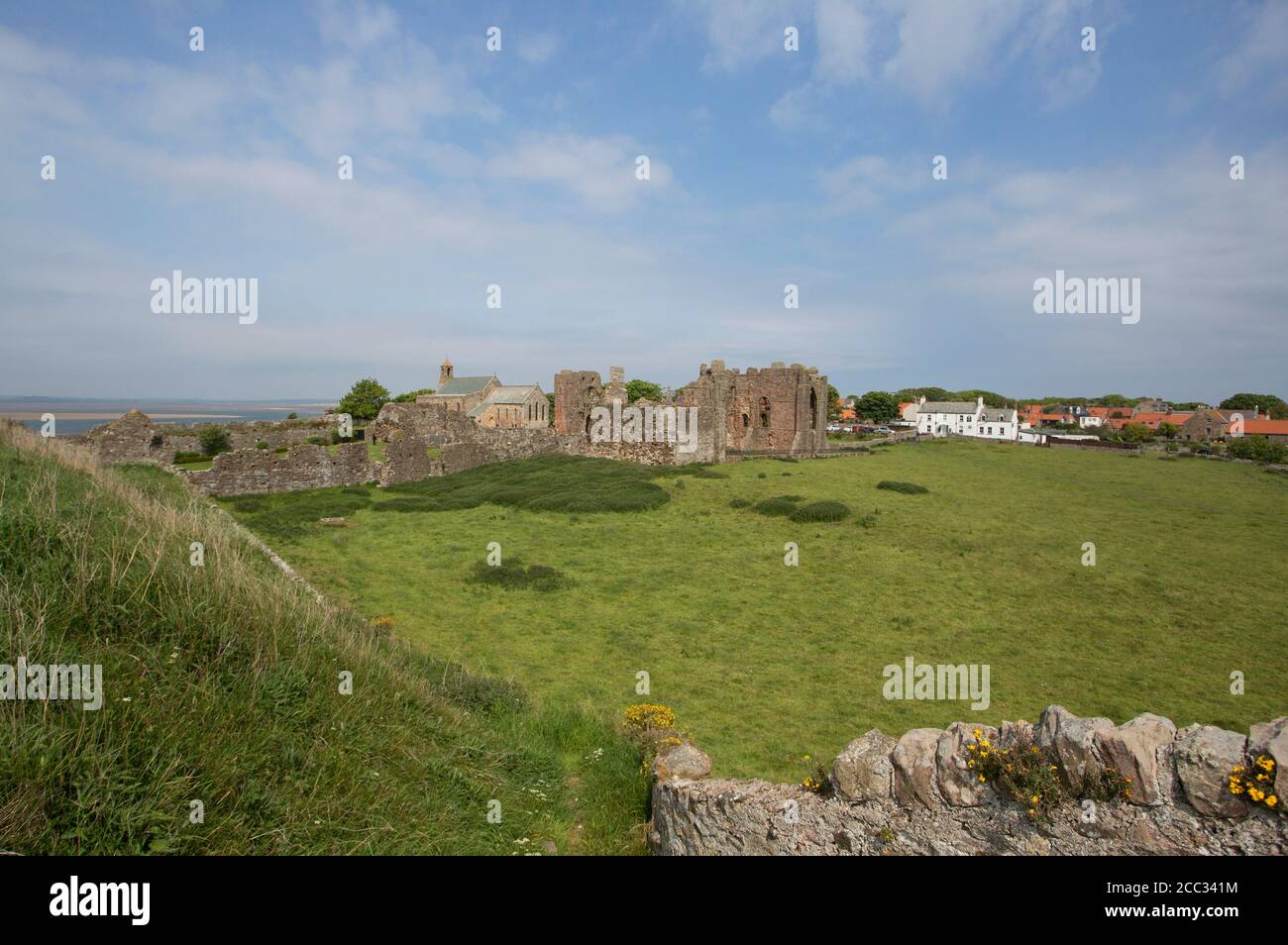 Village and Ruins of Lindisfarne Priory, Holy Island, Northumberland ...