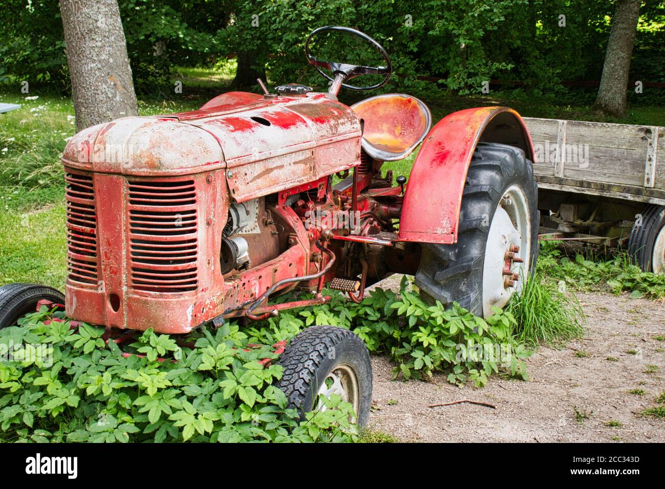 Red vintage tractor Stock Photo - Alamy