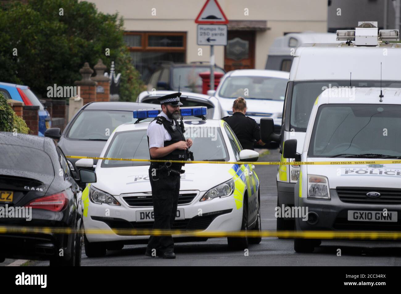 Crime scene police officers police cordon hi-res stock photography and ...