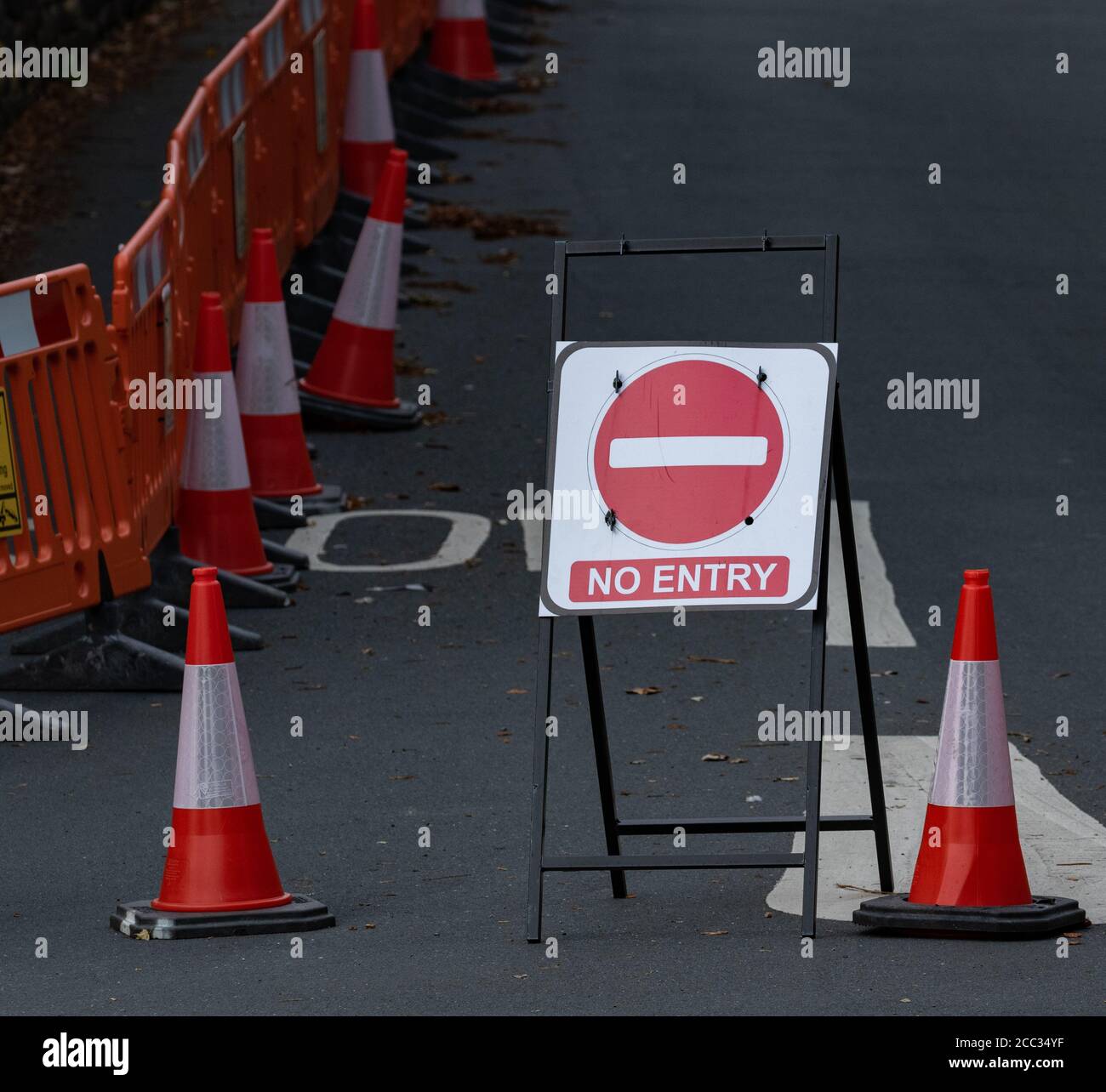 A road block in Baildon, Yorkshire. No Entry Signs, cones and barriers ...