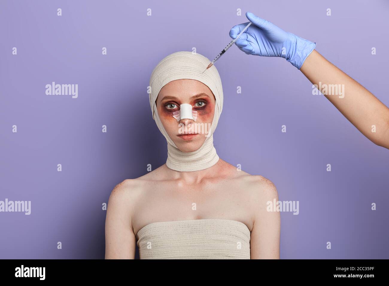 young injured patient is being made an experiment by doctors. isolated ...