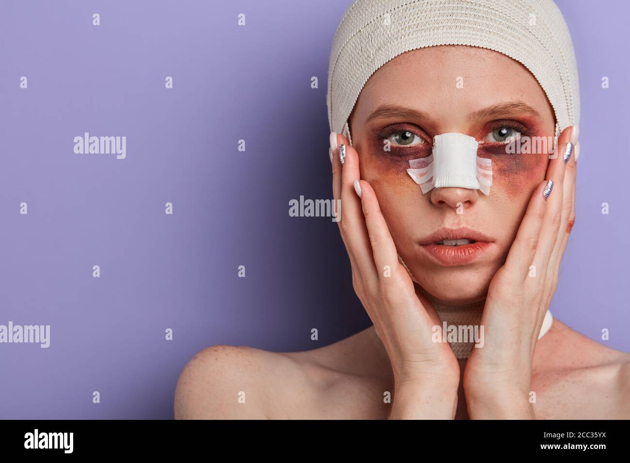 Wrapped face woman bandage hi-res stock photography and images - Alamy