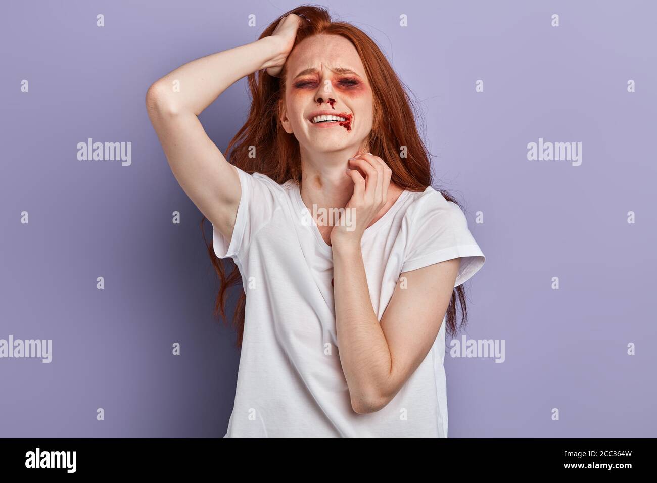 ginger frustrated crying girl turns face to the wall. misery, agony of ...