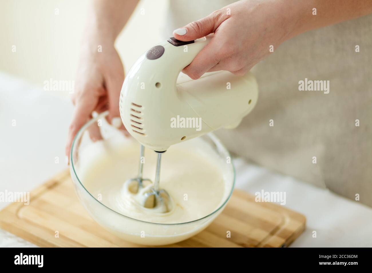process of making tasty cream for cake, close up cropped photo Stock ...