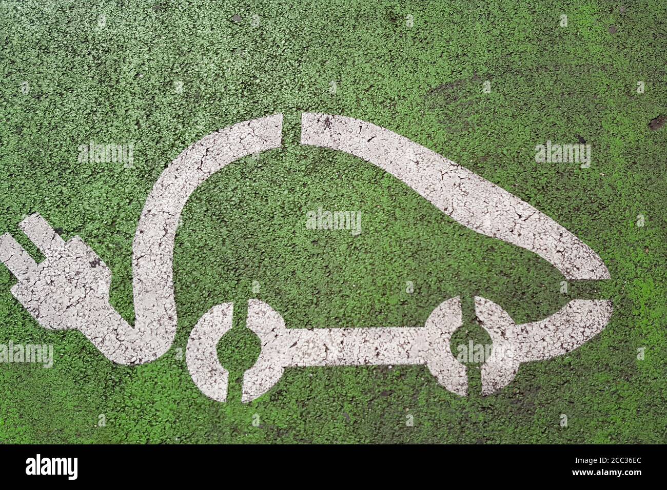 paint on the floor that indicates a parking space reserved for electric ...