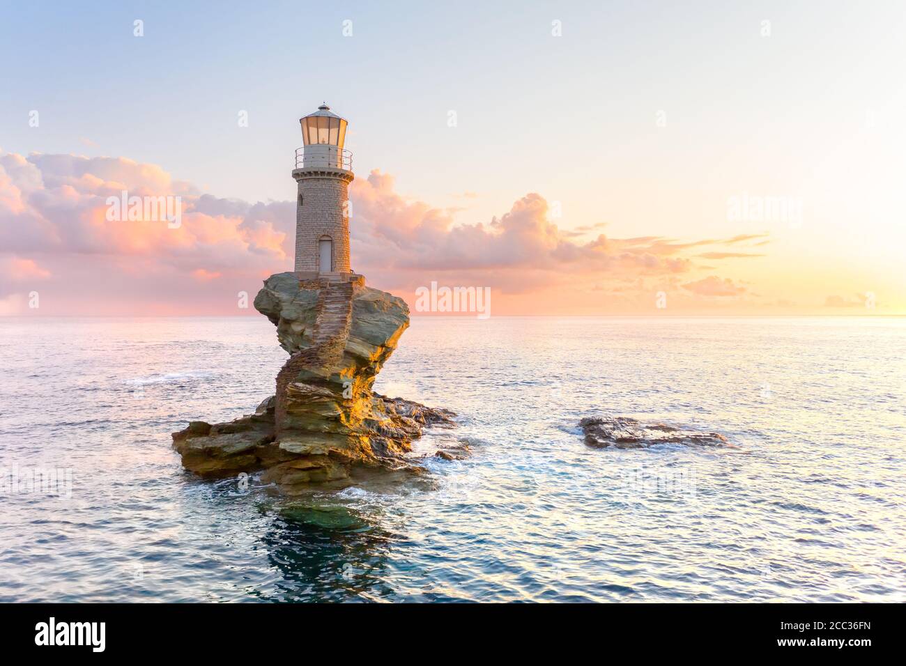 The beautiful Lighthouse Tourlitis of Chora at night. Andros island ...