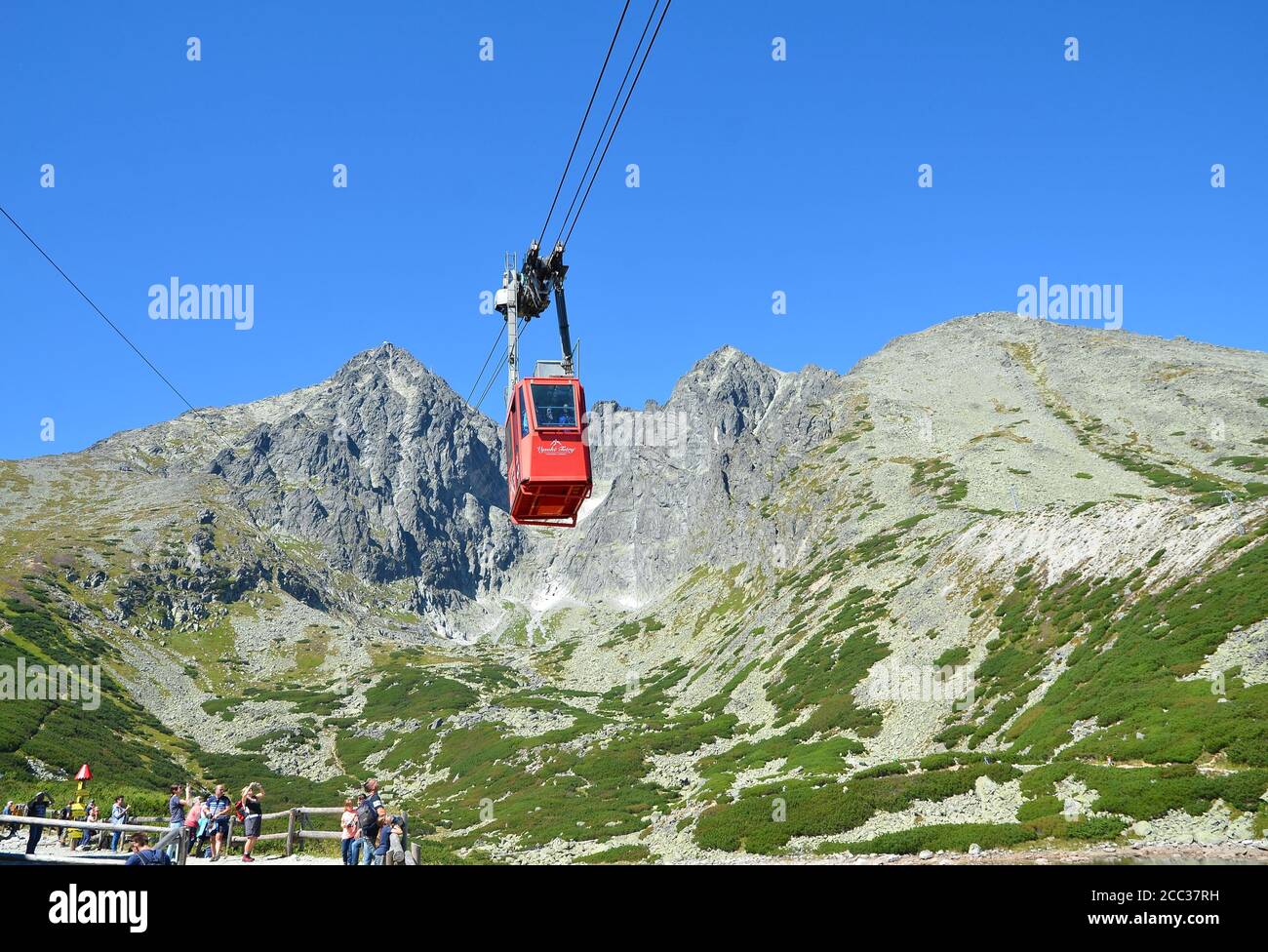 TATRANSKA LOMNICA, SLOVAKIA - August 26, 2016: Red cable car going to ...