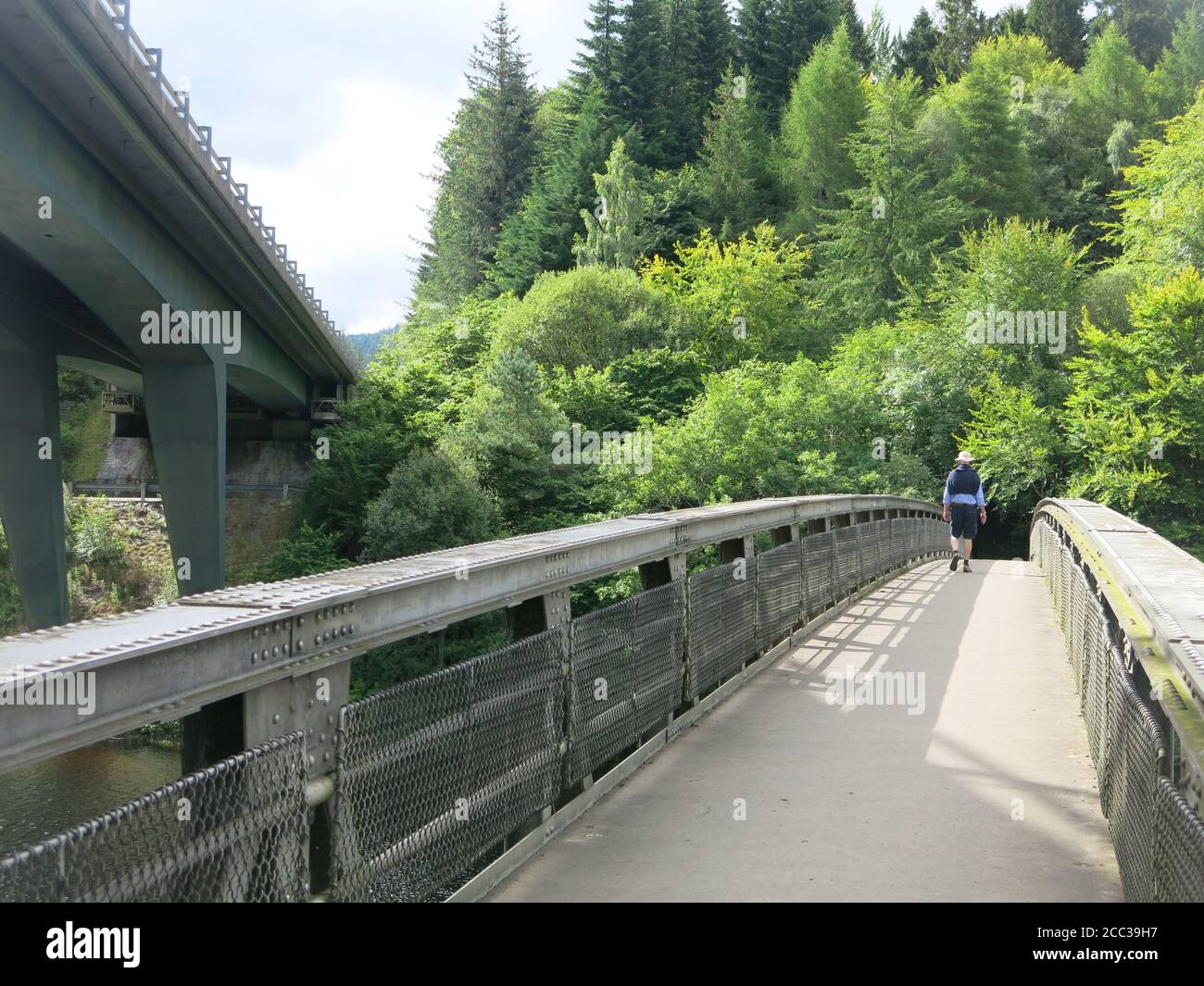 The Clunie footbridge is directly underneath the road bridge taking the ...