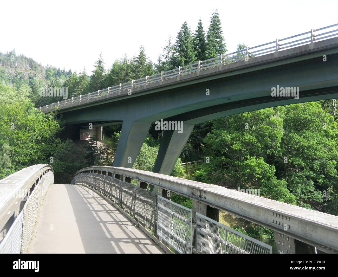 The Clunie footbridge is directly underneath the road bridge taking the ...