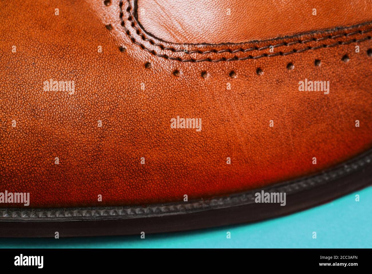 Part of men's shoes close-up. Genuine leather texture. Side view with a ...