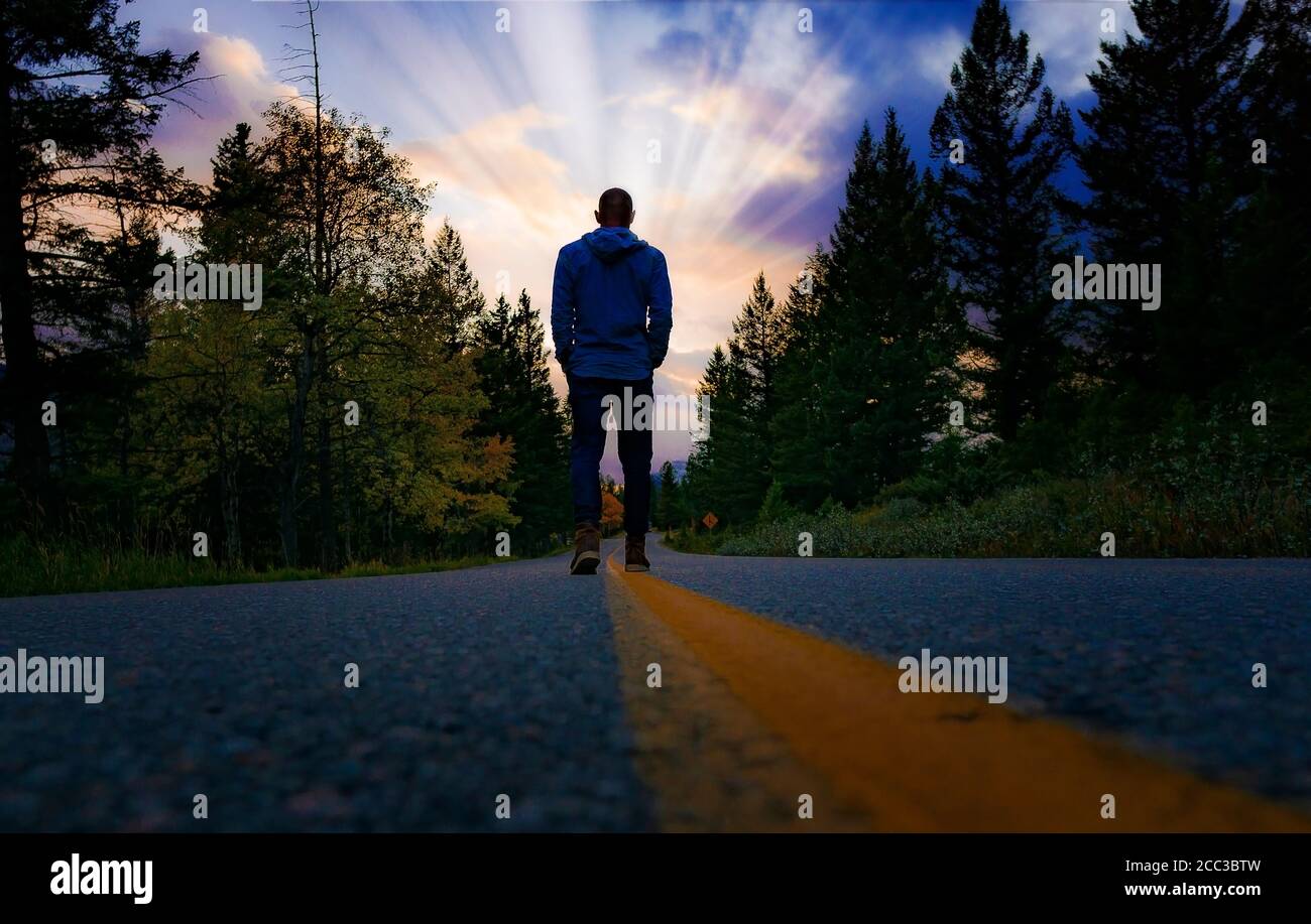 Adventure Travel Concept In Evening On Road Stock Photo - Alamy