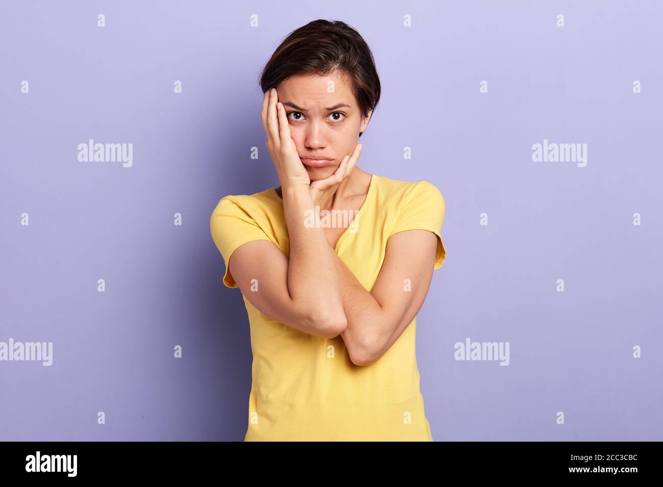 young brunette girl has toothache, close up photo.facial expression ...
