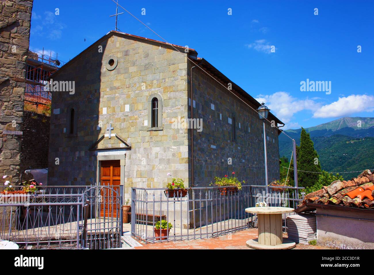 rustic christian church with typical stone walls in a rural village in ...