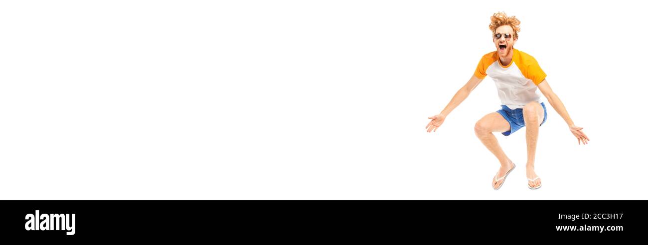 Panoramic orientation of excited man in sunglasses and flip flops ...