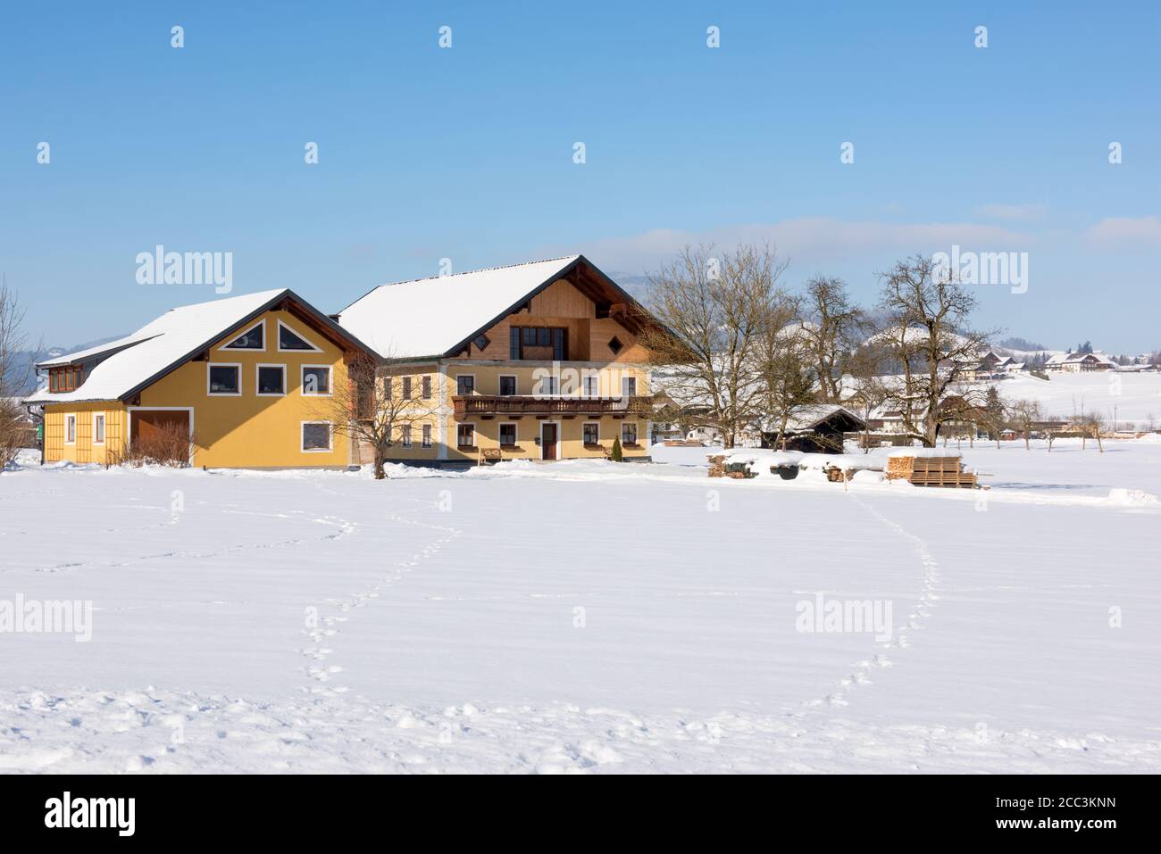 Traditional farmhouse and barns in farmland near Salzburg, in Austria ...