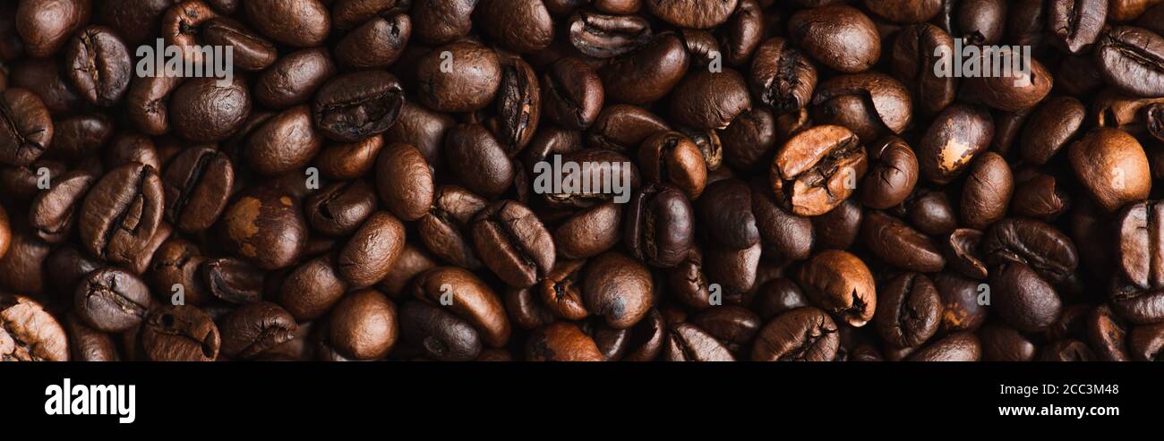 top view of fresh roasted coffee beans background, panoramic shot Stock ...