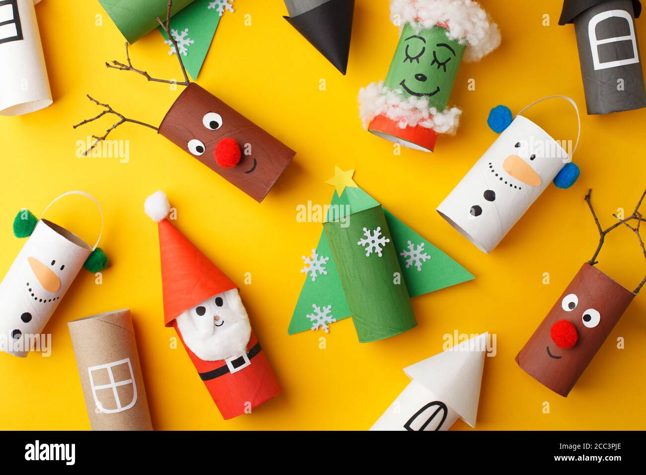 Christmas new year crafts, paper santa, snowman, grinch on yellow paper ...