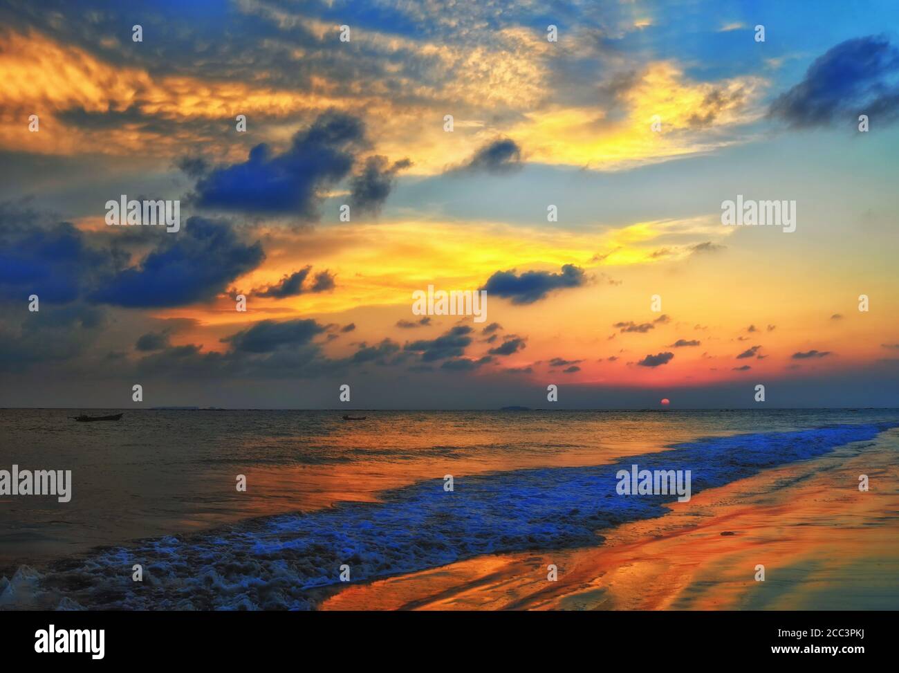 sunset over the ocean Stock Photo - Alamy