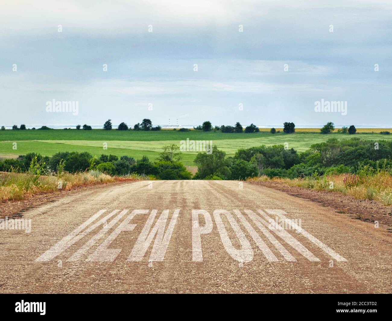 VIew point. Asphalt road in countryside. Natural skyline with green of ...