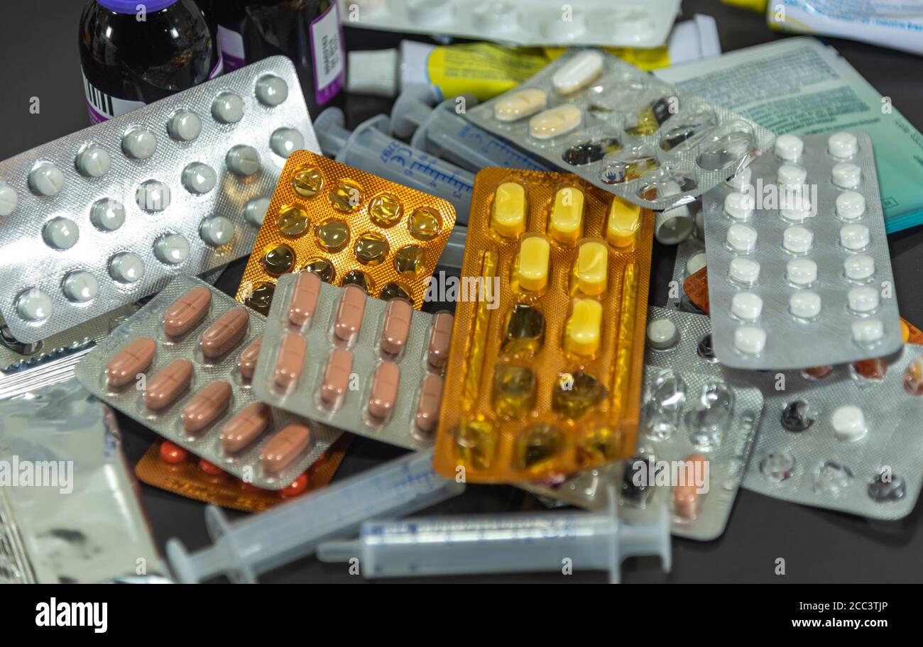 Bottles and pills. A tablet is the solid form of a medicated powder ...