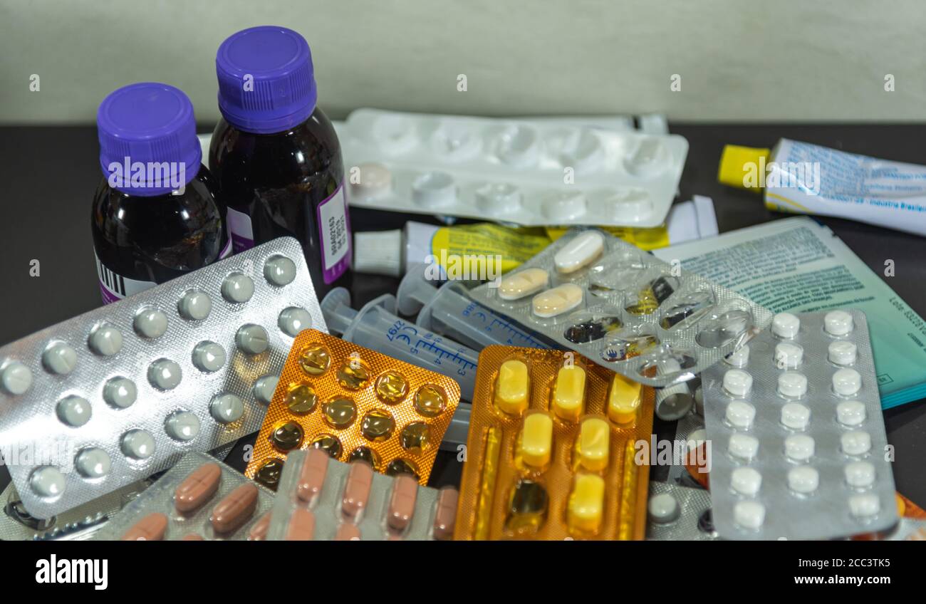 Bottles and pills. A tablet is the solid form of a medicated powder ...