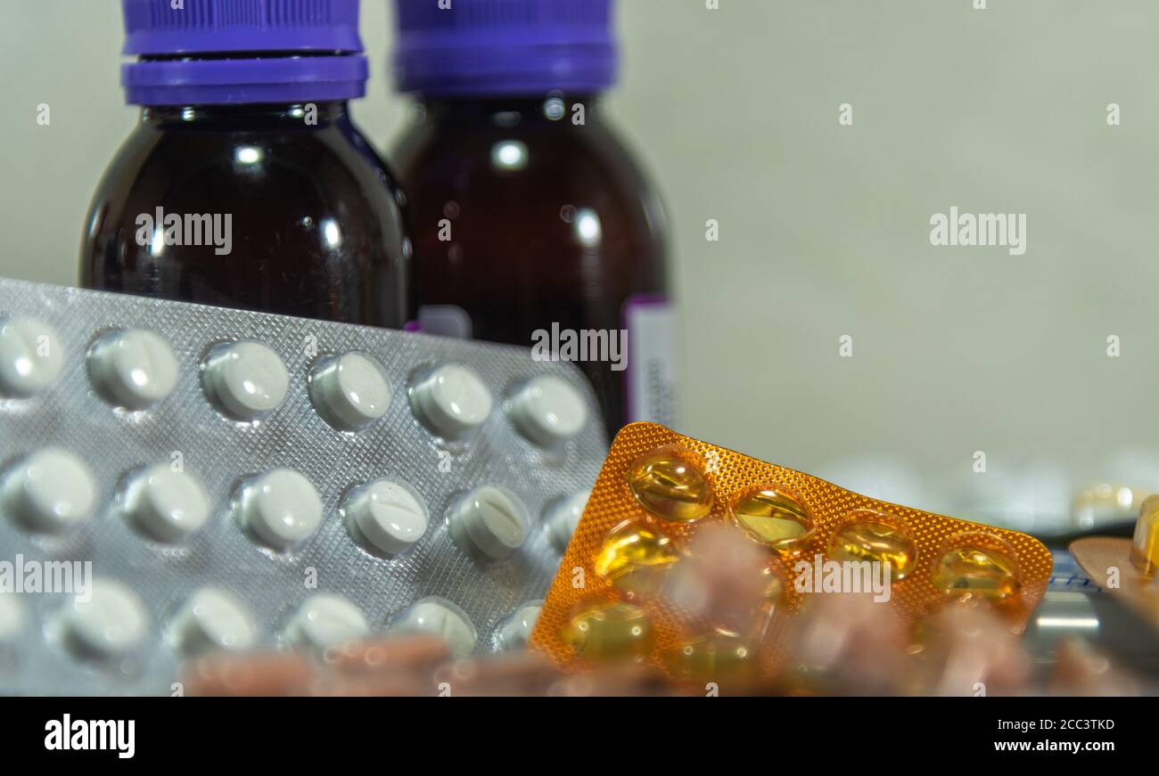 Bottles and pills. A tablet is the solid form of a medicated powder ...