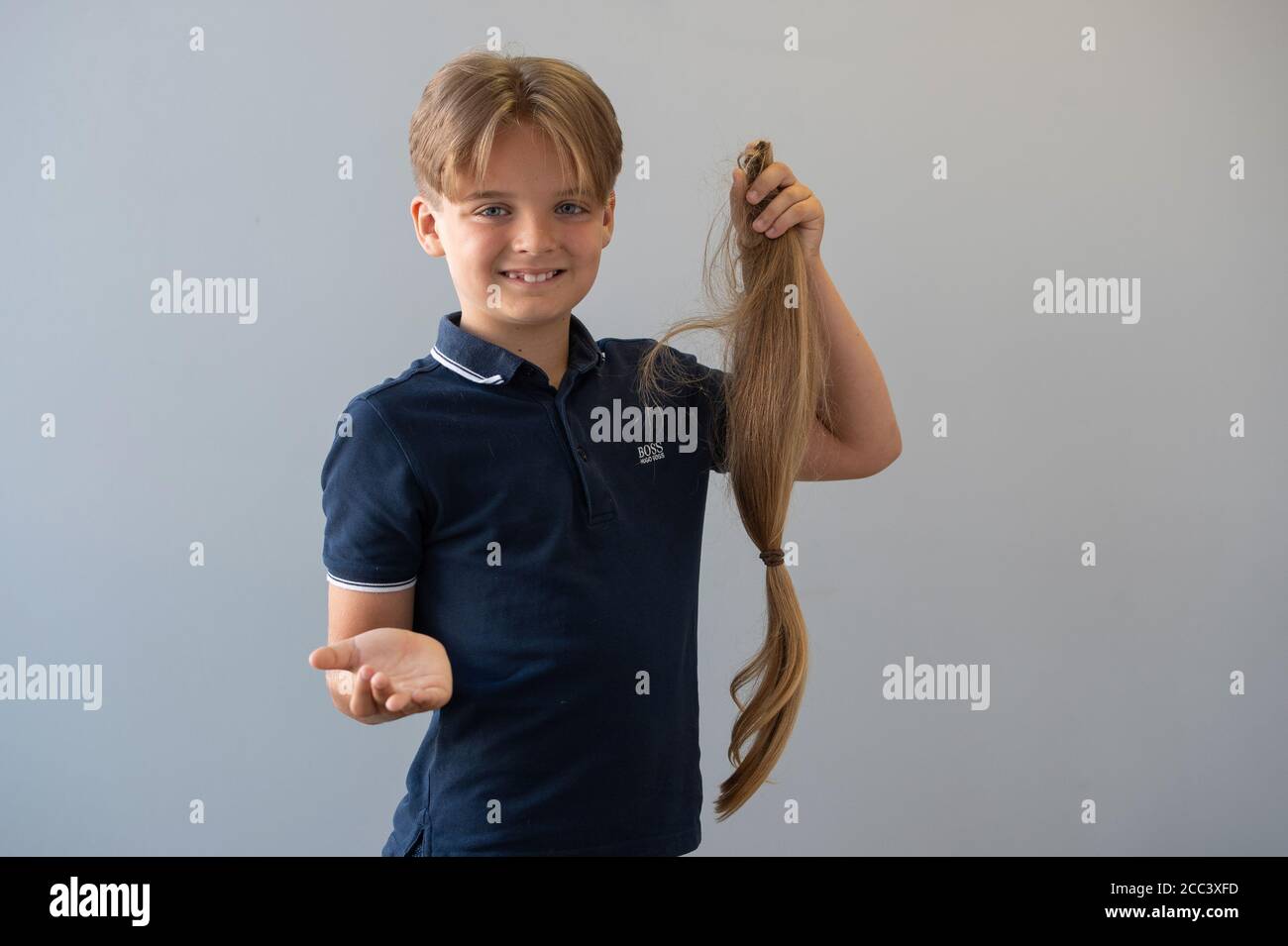 Reilly Stancombe after having his first ever haircut at Masters ...