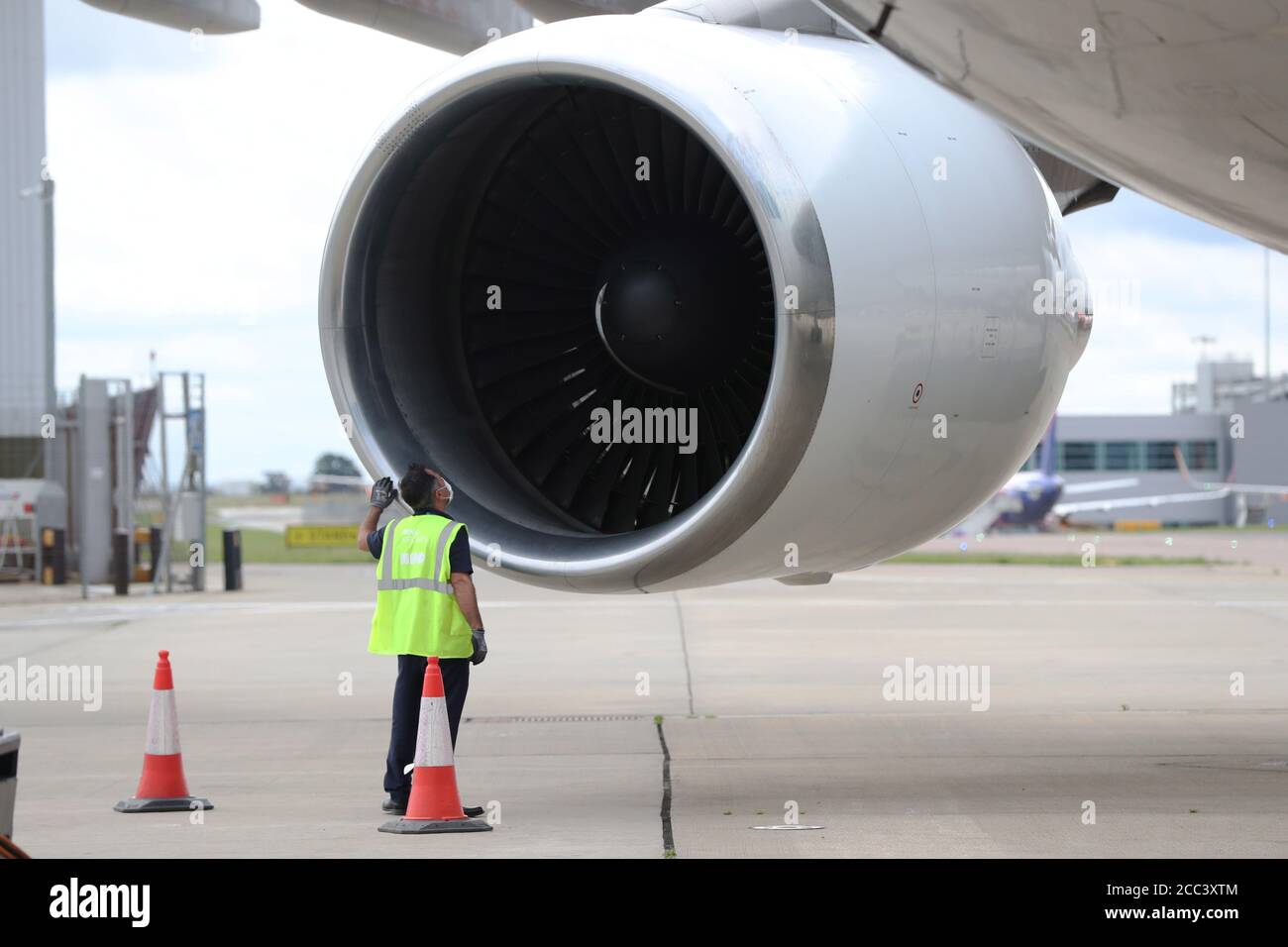An MNG flight engineer carries out pre flight checks on an MNG Airlines ...