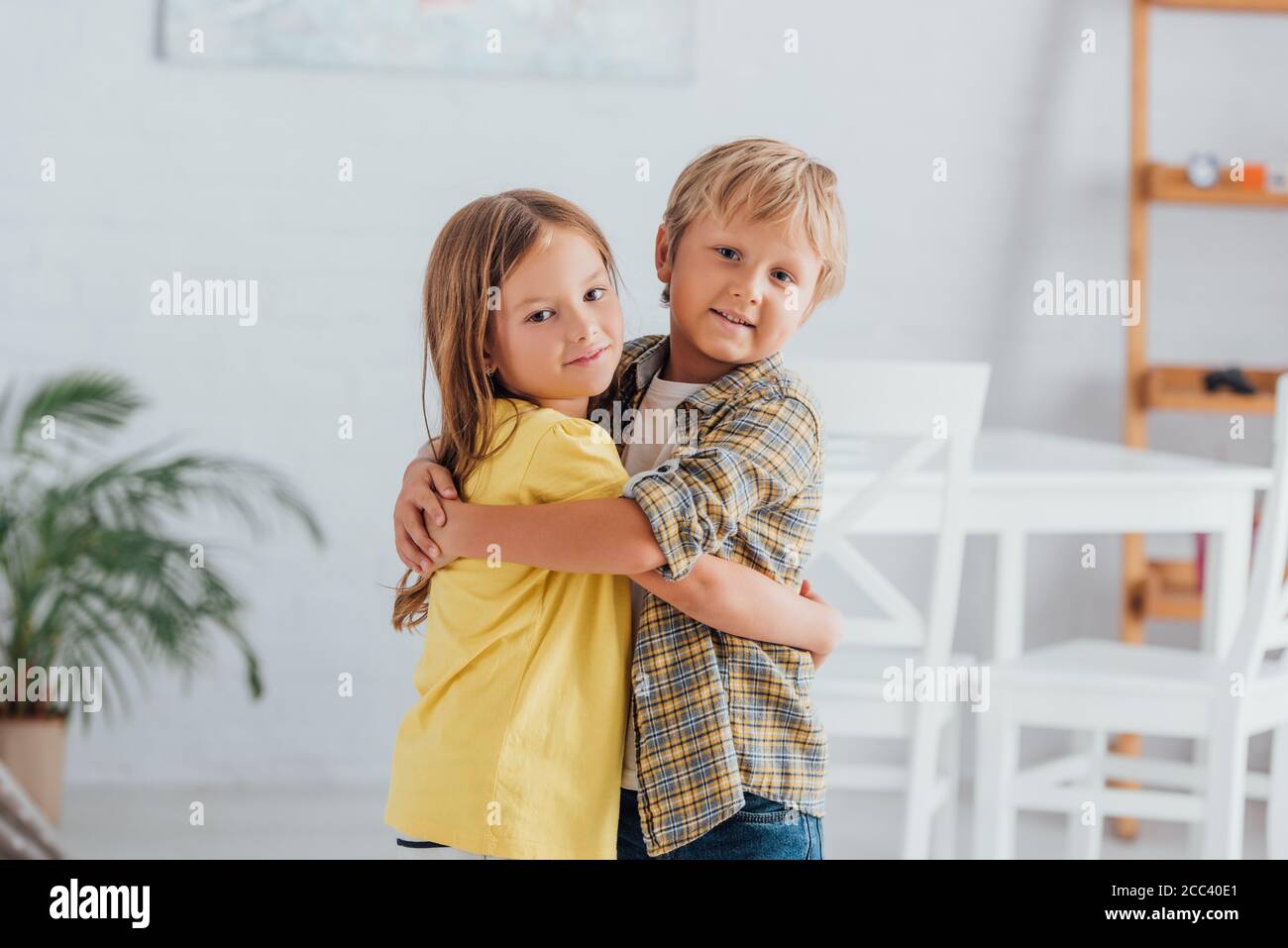 Preteen boy standing yellow hi-res stock photography and images - Alamy