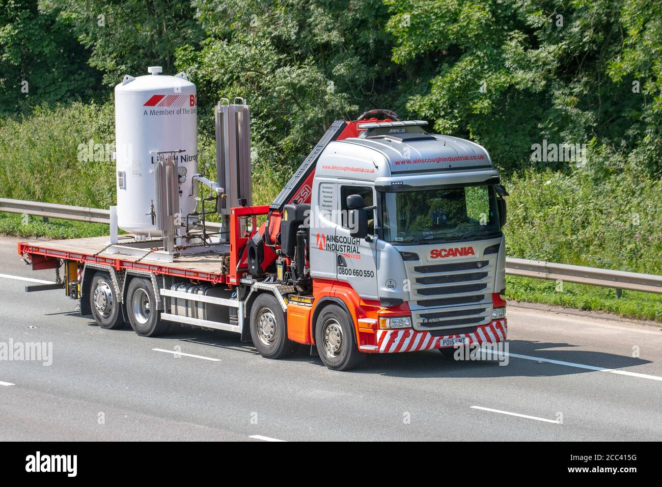Low loader lorry carrying heavy hi-res stock photography and images - Alamy