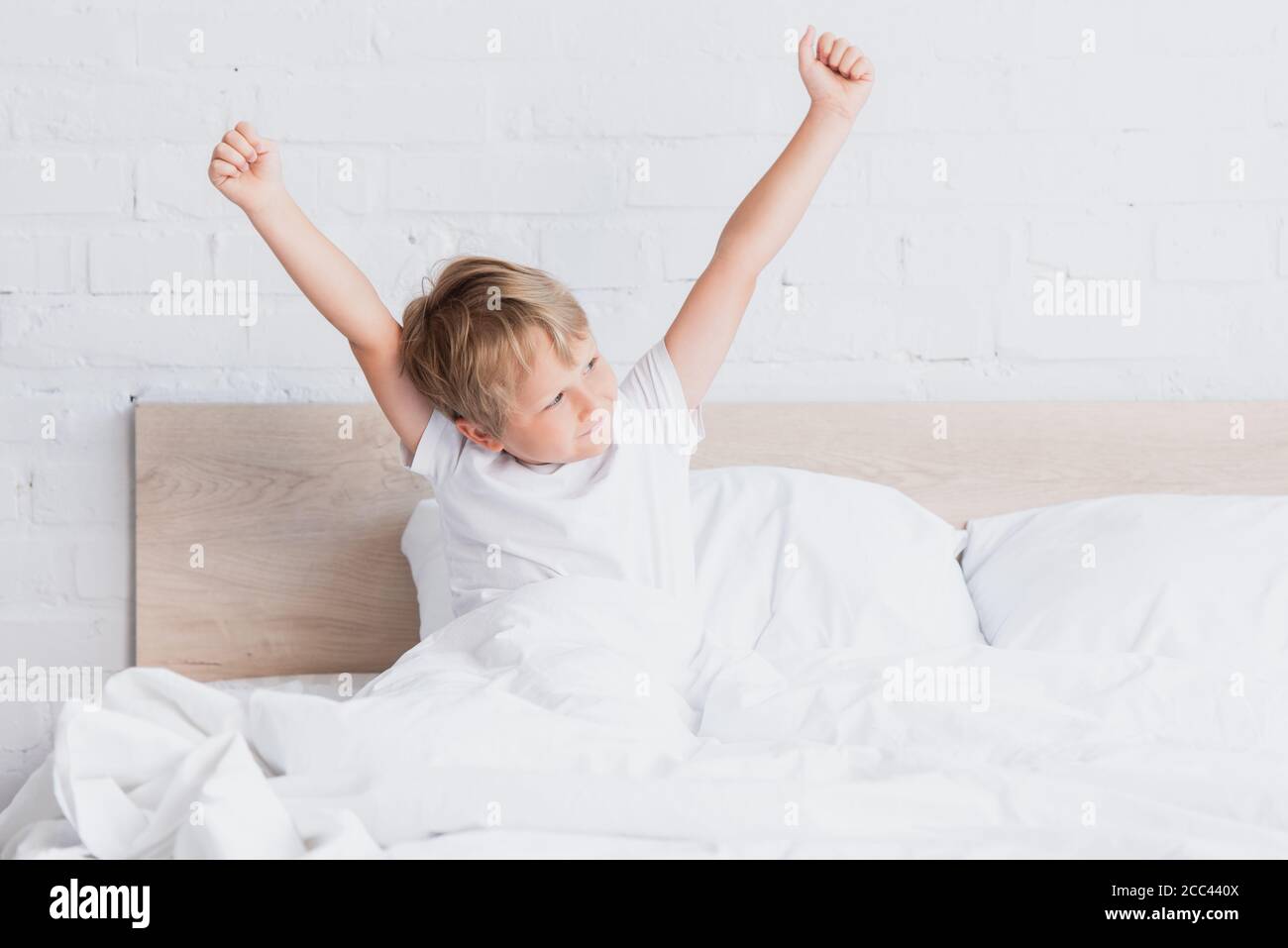 Boy awake bed hi-res stock photography and images - Alamy