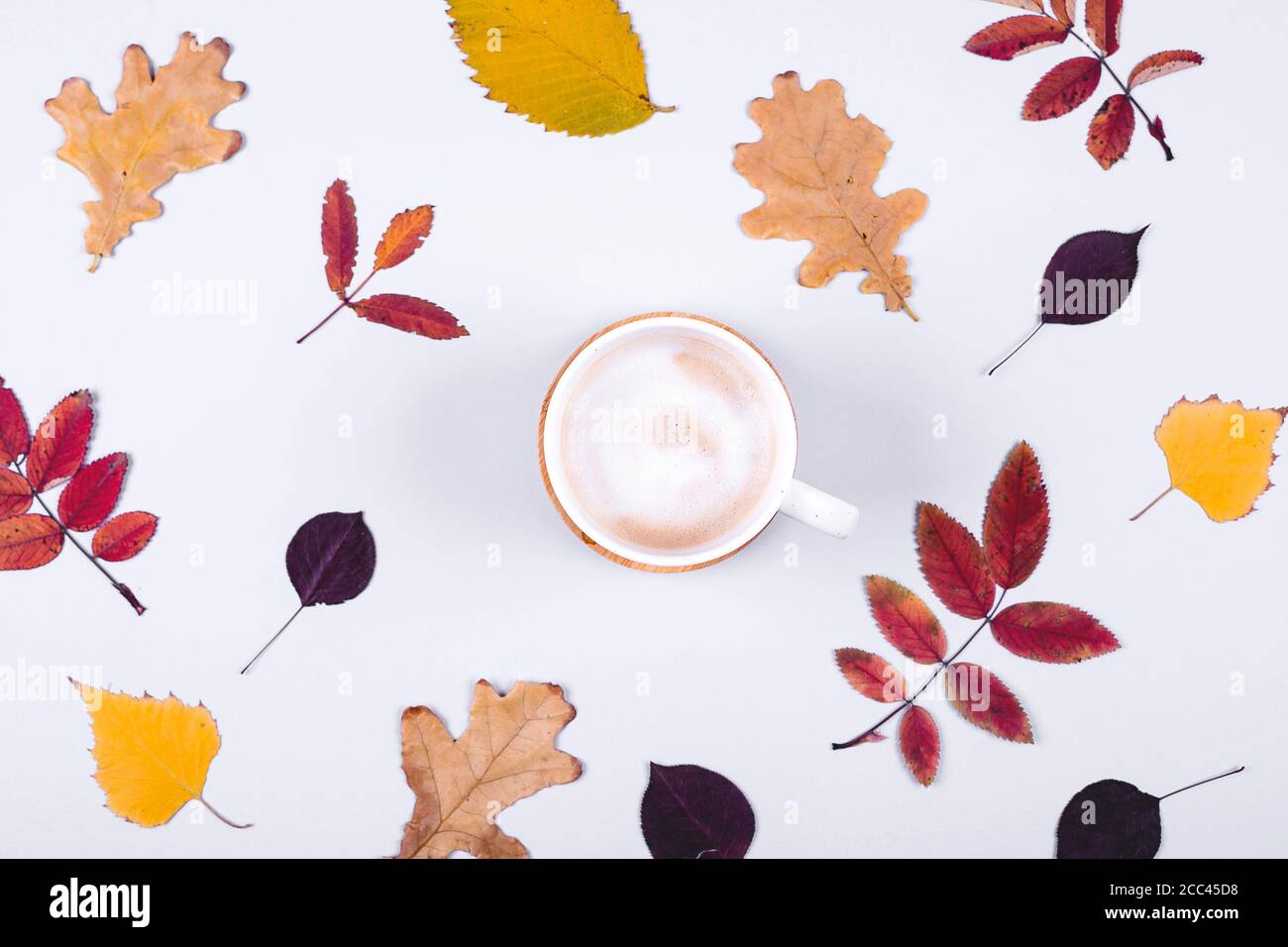Autumn Fall Background with leaves and cup of coffee. Hello Autumn card ...
